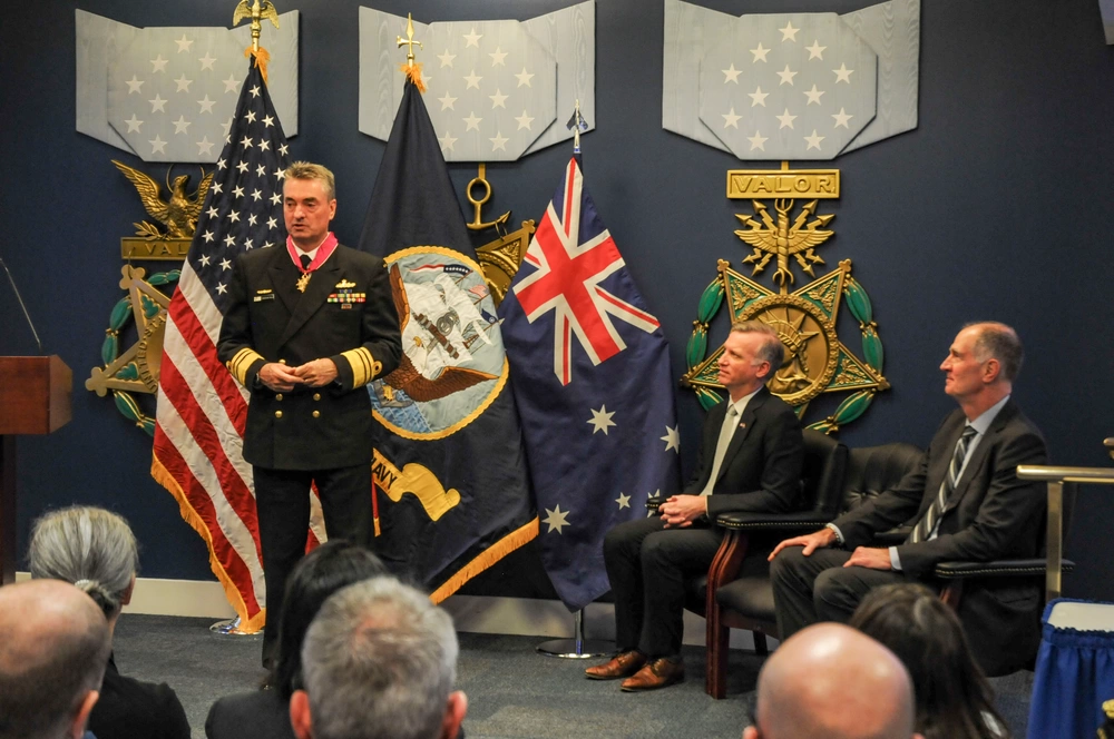 Under Secretary of the Navy Erik Raven presents Royal Australian Navy ...